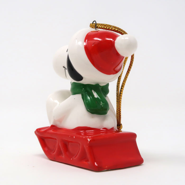Snoopy on Sled Christmas Ornament - ShopCollectPeanuts.com