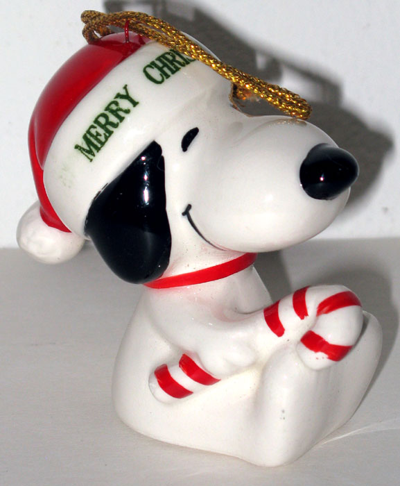 Snoopy sitting holding candy cane dated 1977 Christmas Ornament ...
