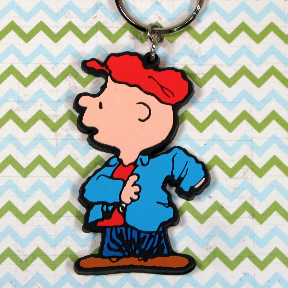 Charlie Brown putting on jacket Keychain - ShopCollectPeanuts.com