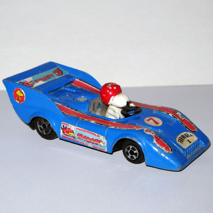 Snoopy in Blue Formula 1 Race Car - CollectPeanuts.com