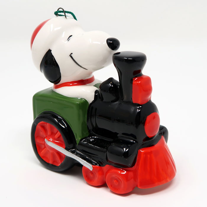 Snoopy on Train Engine Ceramic Christmas Ornament - ShopCollectPeanuts.com